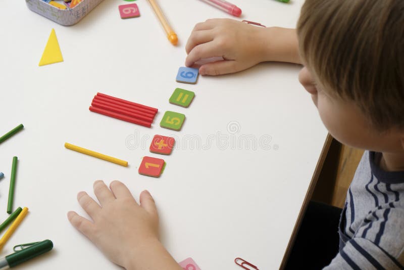 Little Boy Preparing for Elementary School Doing Simple Math Exercises ...