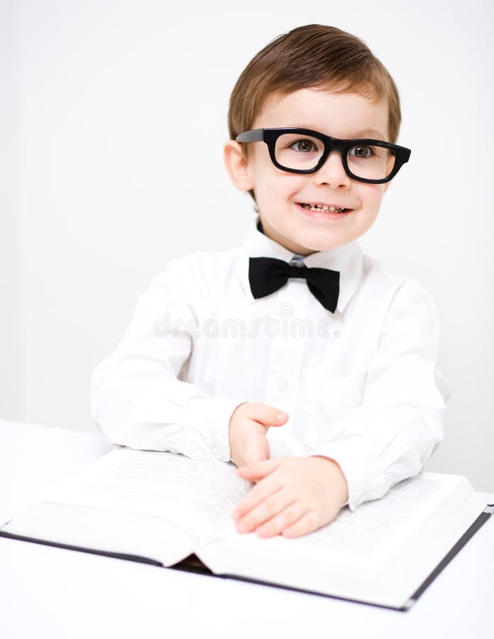 Little Boy is Reading a Book Stock Image - Image of childhood, indoors ...