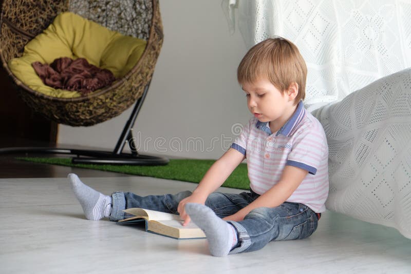 Little Boy is Reading a Book Stock Photo - Image of person, beautiful ...
