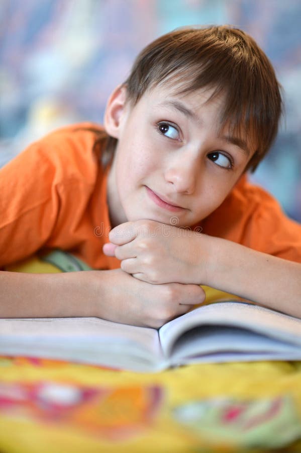 Little boy reading a book stock photo. Image of relax - 31268114