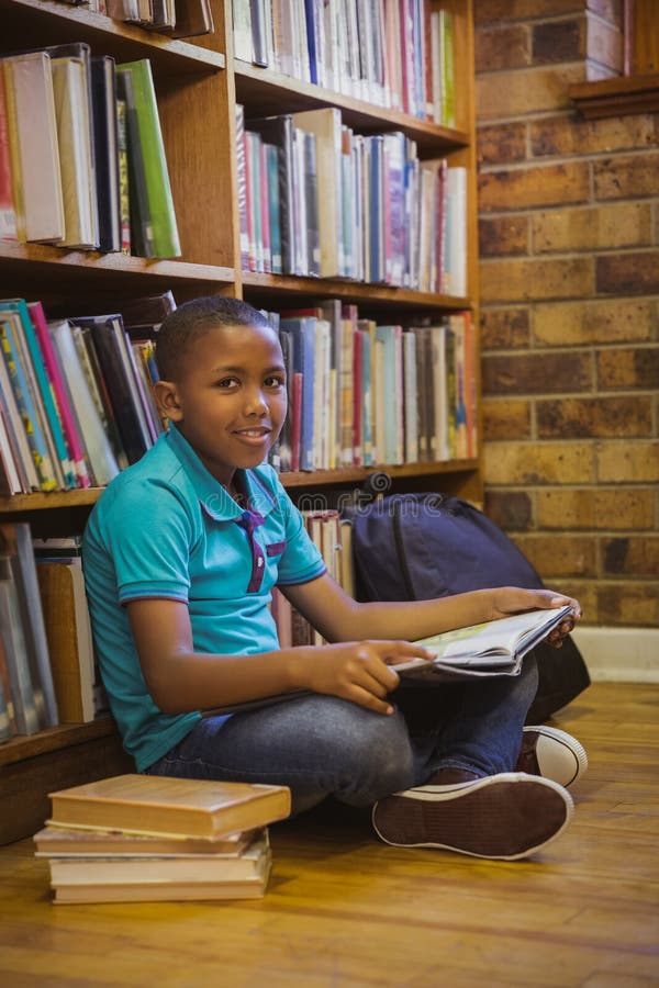 Little Boy Reading on Library Floor Stock Photo - Image of knowledge ...