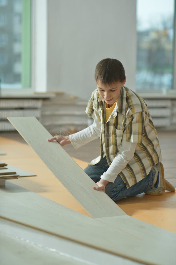 Little Boy Repairing in the Room Stock Image - Image of little ...