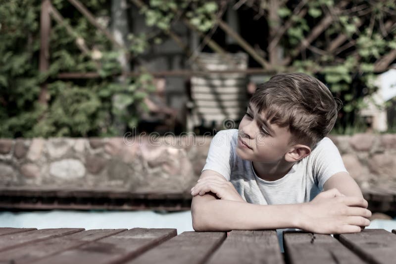 A Little Boy is Resting on a Private Plot Stock Image - Image of boys ...