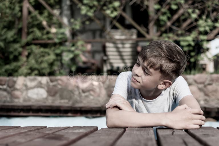 A Little Boy is Resting on a Private Plot Stock Image - Image of boys ...
