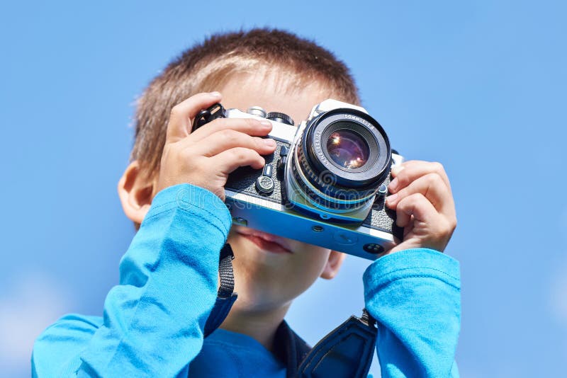 Little Boy with Retro SLR Camera on Blue Sky Stock Photo - Image of ...