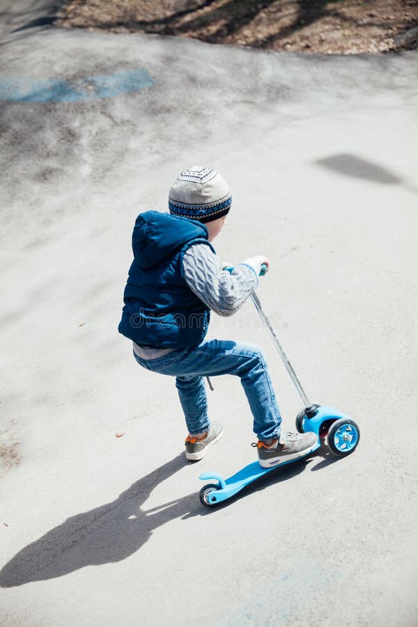 Little Boy Riding Scooter Game Street Spring Stock Image - Image of ...