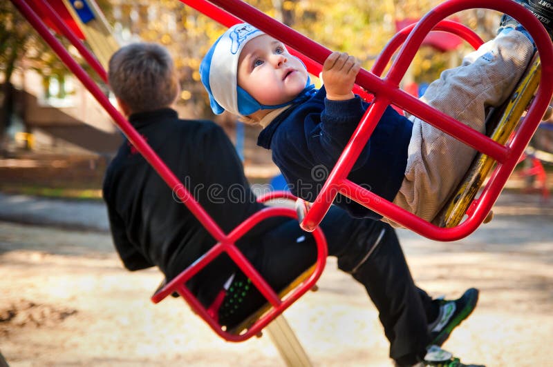 Little Boy Riding on a Swing Stock Photo - Image of motion, swing: 33152782