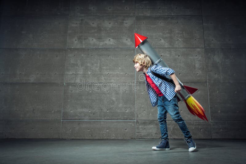 Little Boy with Rocket in Studio Stock Image - Image of space ...
