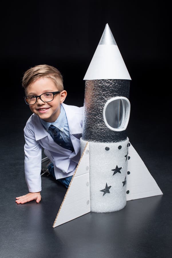 Little boy with rocket stock photo. Image of blueprints - 90785430