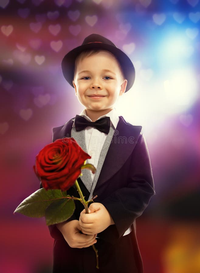 Little boy with rose stock photo. Image of loving, cute - 36893634