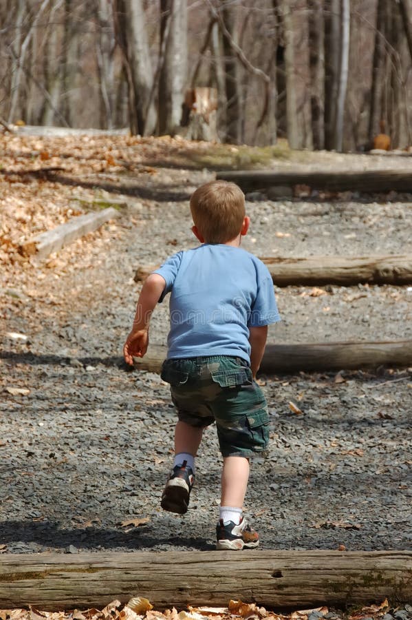 Little boy running stock image. Image of forest, fast, shadows - 700527