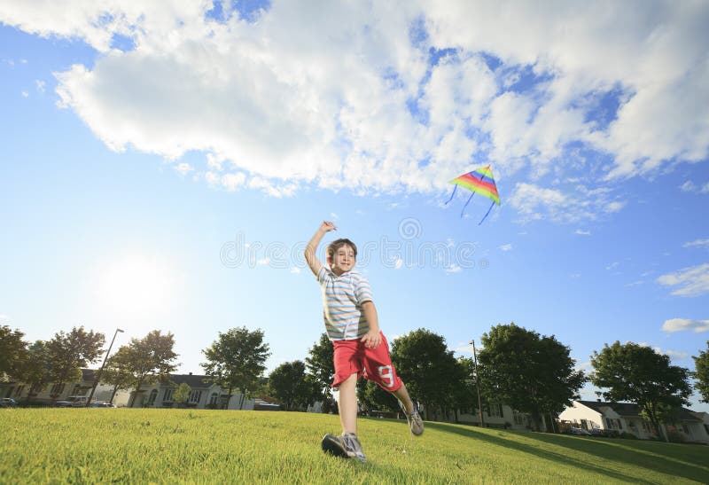 Little Boy Running in Park with a Kite Stock Photo - Image of activity ...