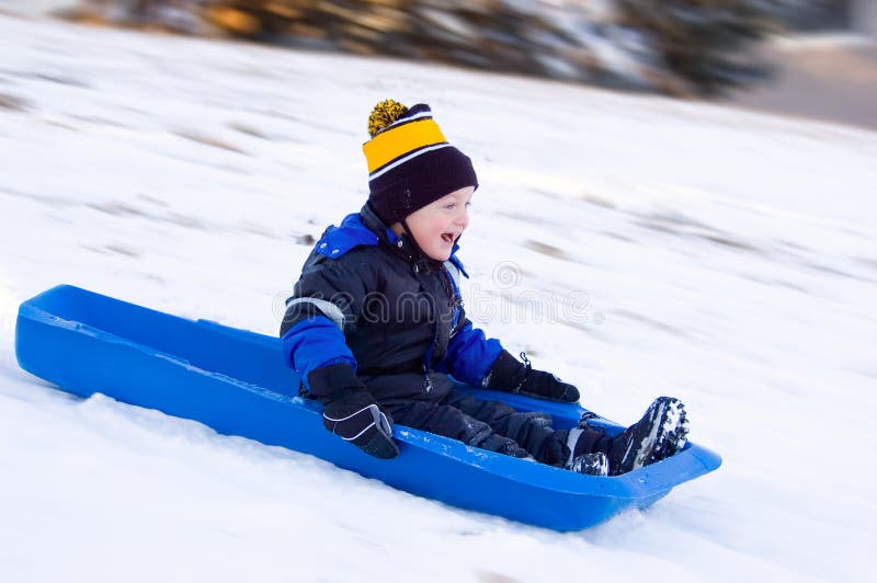 Little Boy S First Sled Ride Stock Photo - Image of happy, sledding ...