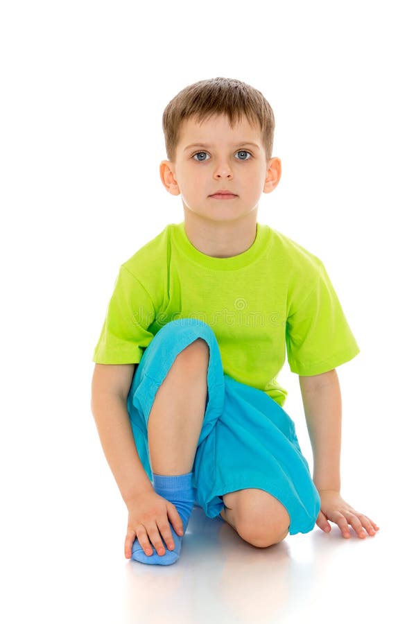 Little Boy Sat Down on One Leg Stock Image - Image of european ...