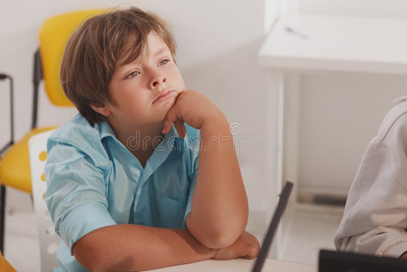 Little boy at school class stock image. Image of device - 201177849