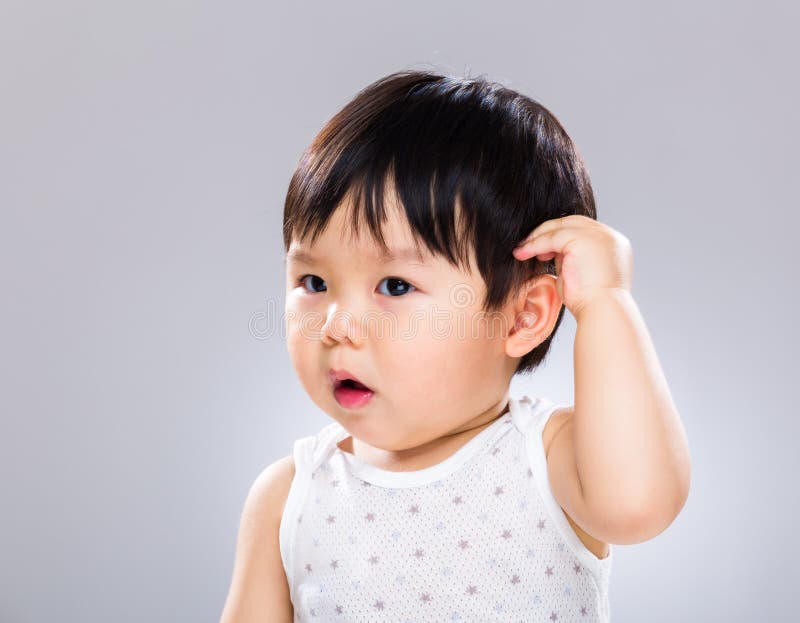 Boy Scratch His Head Isolated on Blue Stock Photo - Image of childhood ...