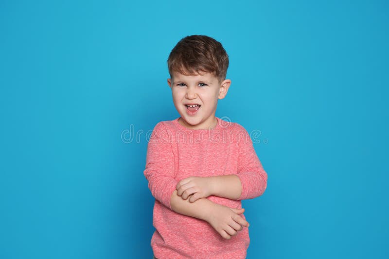 Little Boy Scratching Belly on Color Background. Stock Image - Image of ...