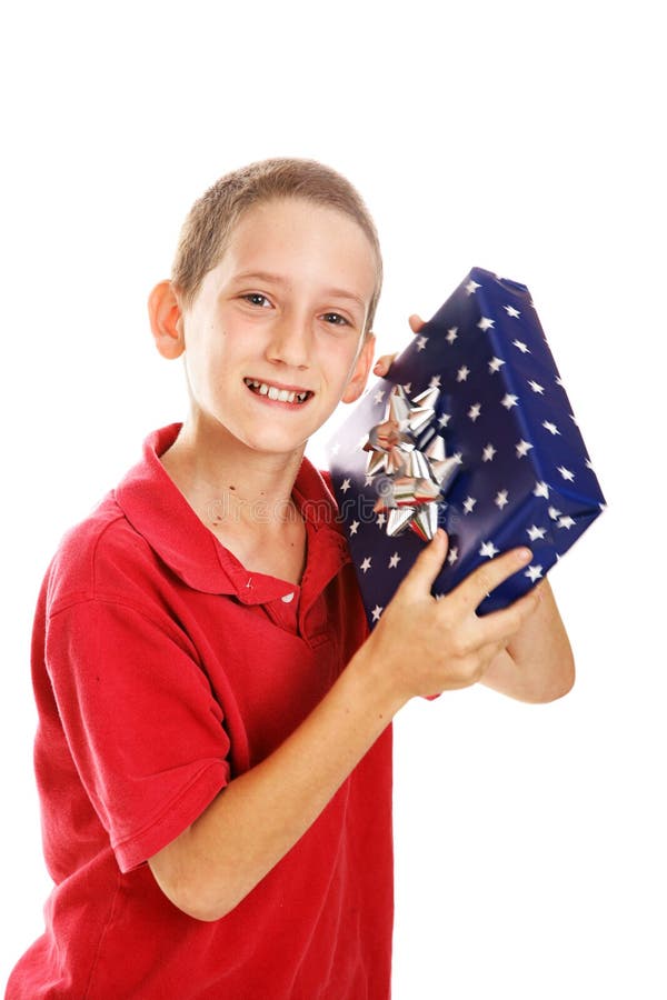 Little Boy Shaking Holiday Gift Stock Photo - Image of gift, shaking ...