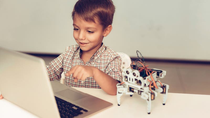 Little Boy in Shirt Programming Robot at Home. Stock Photo - Image of ...