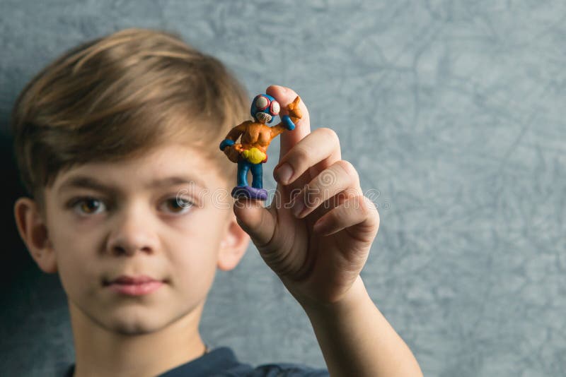 Little Boy Shows Off His Plasticine Crafts Stock Image - Image of dough ...