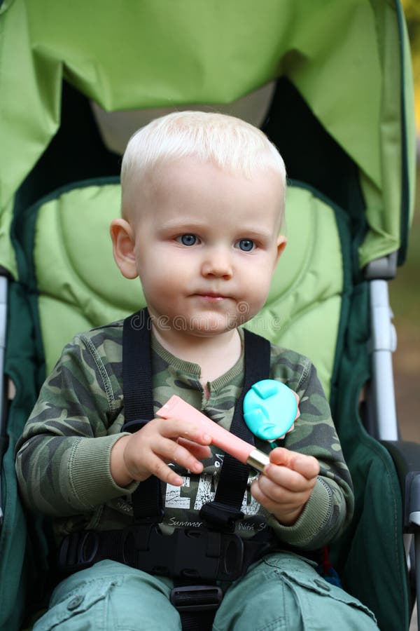 Little Boy Sitting in Stroller Stock Image - Image of activity, child ...