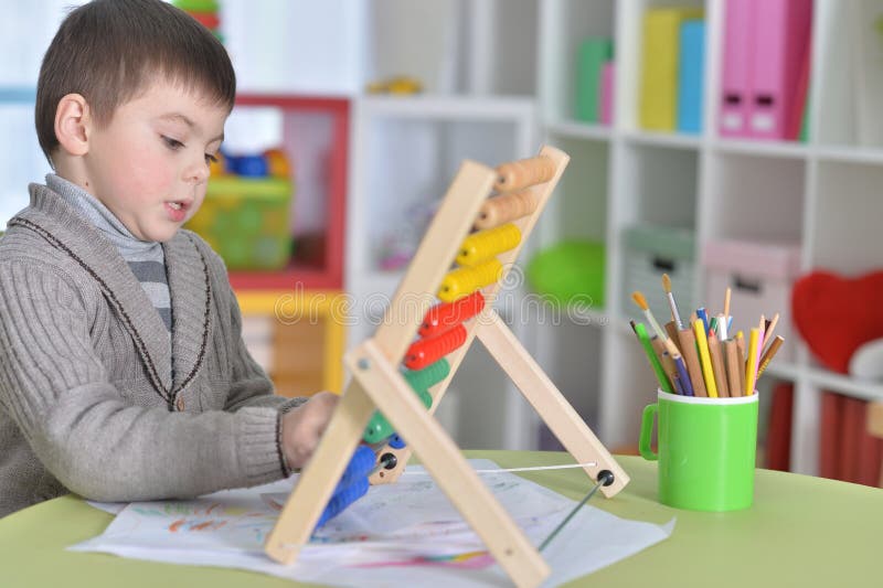 Portrait of Boy Learning To Use Abacus Stock Photo - Image of concept ...