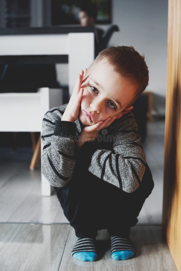 The little boy is very sad stock photo. Image of eating - 139808394