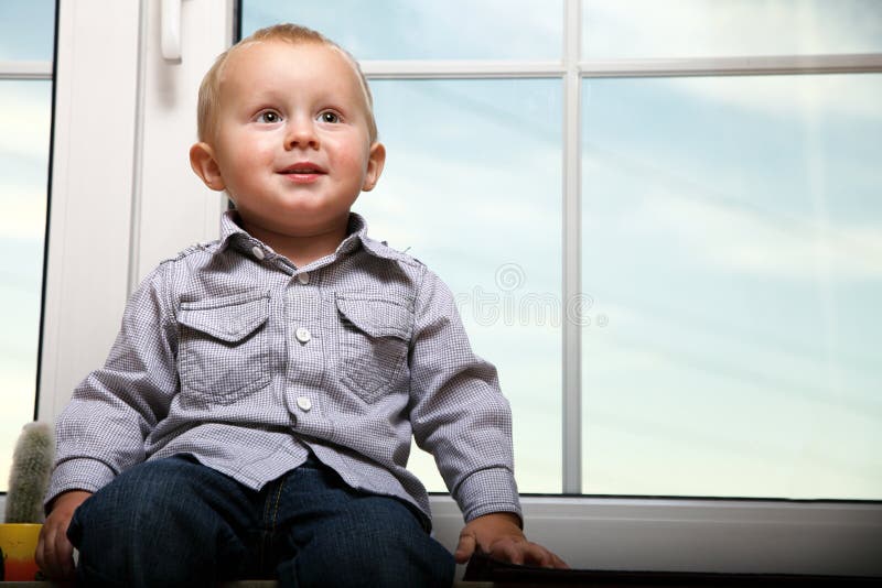 Little Boy Sitting on Window Stock Image - Image of childhood, young ...