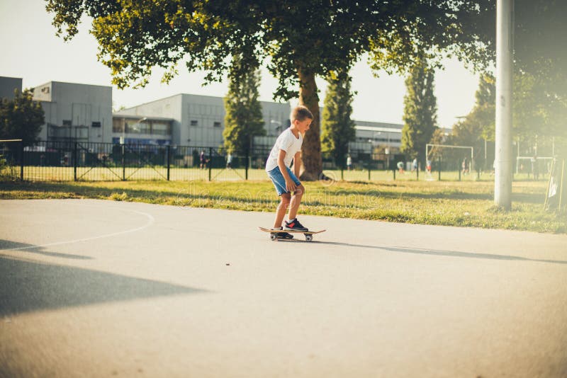 Little boy on skateboard. stock image. Image of skateboard - 126091199