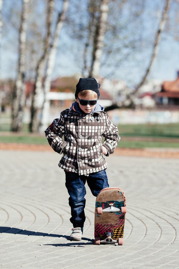 Little Boy with Skateboard on the Street Stock Image - Image of modern ...