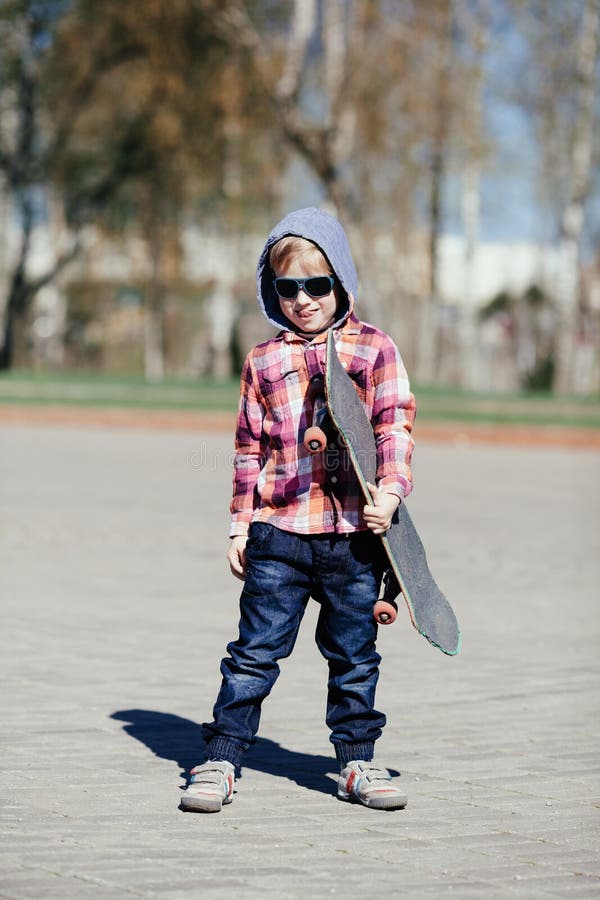 Little Boy with Skateboard on the Street Stock Image - Image of ...