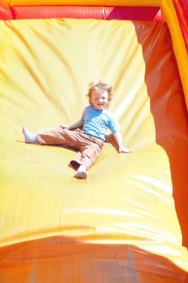 Little boy on a slide stock photo. Image of child, outdoor - 14405510