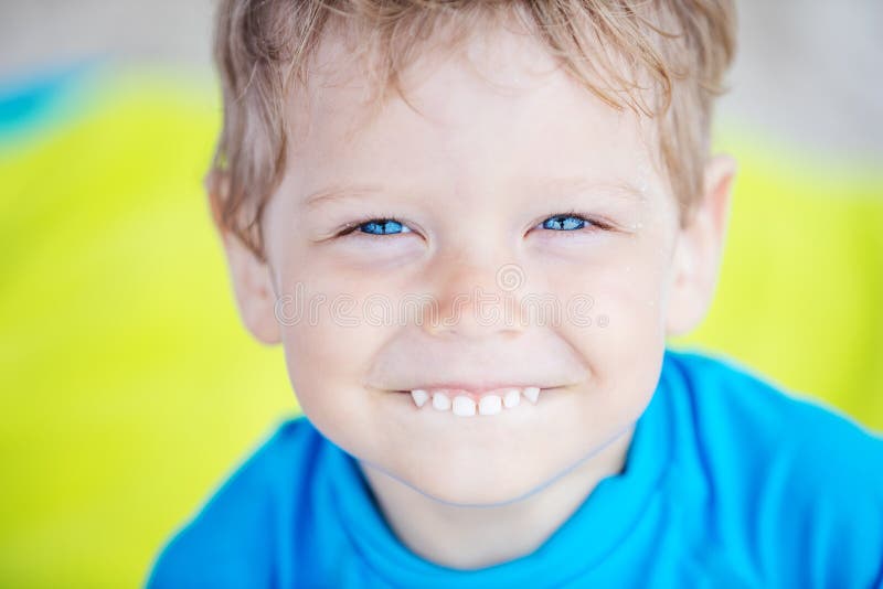 Little Boy Smiling on the Beach Stock Image - Image of nature, blue ...