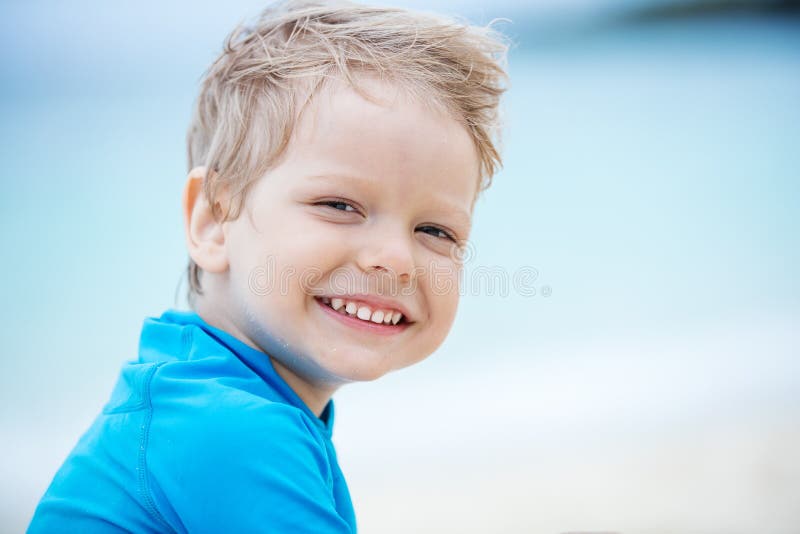 Little Boy Smiling on the Beach Stock Image - Image of small, summer ...