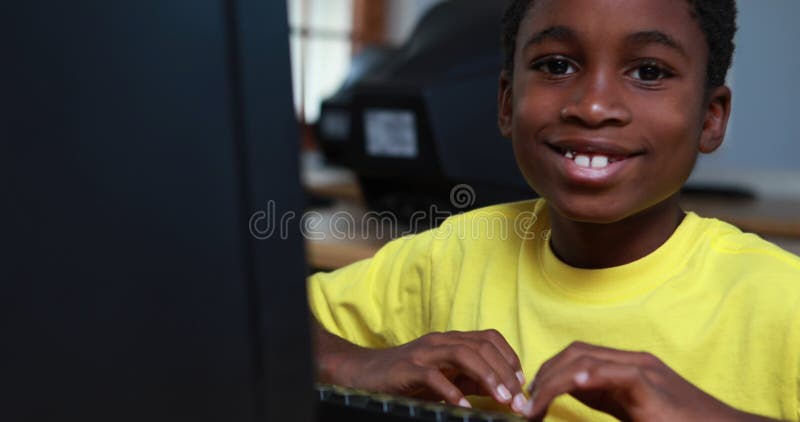 Little Boy Smiling at Camera during Computer Class Stock Footage ...