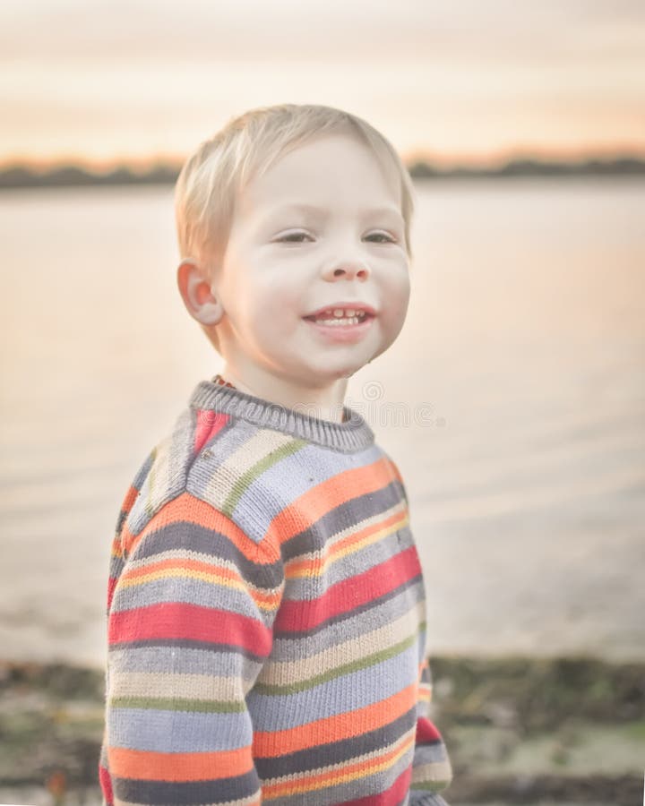 Little Boy Smiling really Big Stock Image - Image of wearing, sweater ...