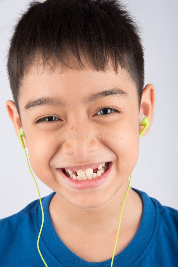 Little Boy Smiling Using Earphone Headset Listen the Music Stock Photo ...