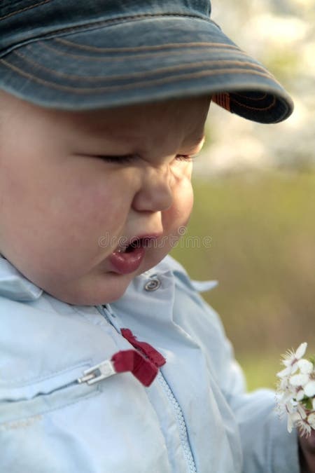 Little boy sneezing stock photo. Image of cute, discover - 13601276