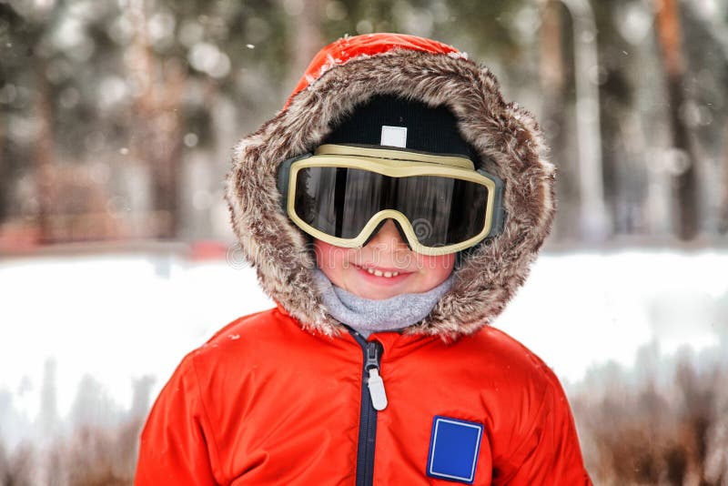 Little Boy with Snowboard Goggles Stock Photo - Image of arms ...