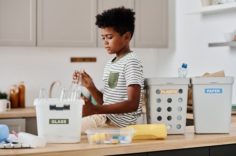 Boy Sorting Plastic in Containers Stock Photo - Image of separation ...