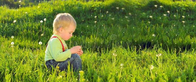 Little Boy on Spring Green Grass Background Stock Image - Image of ...