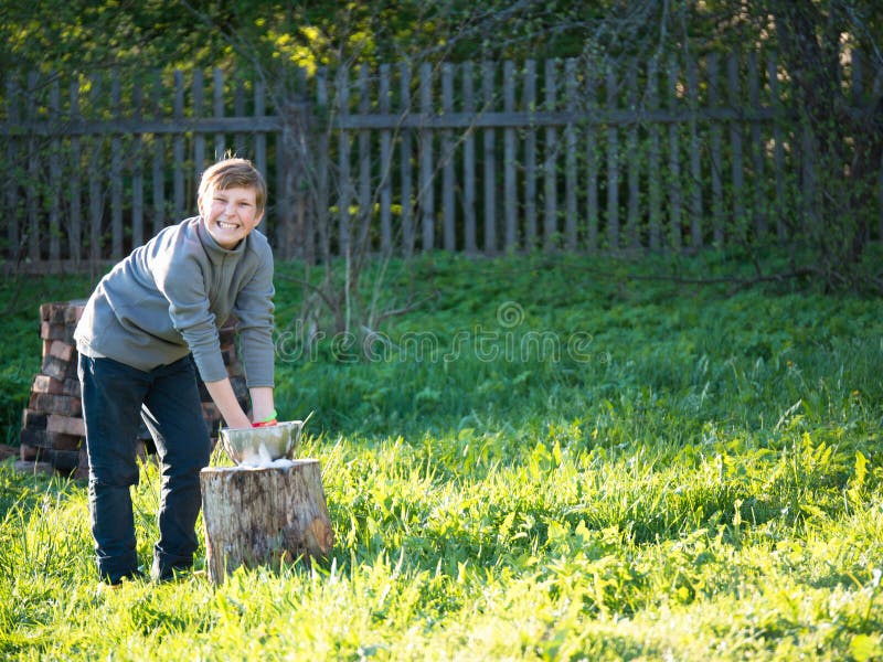 Smiling Little Boy Sitting on a Bed Under a Blanket and Hugging Her ...