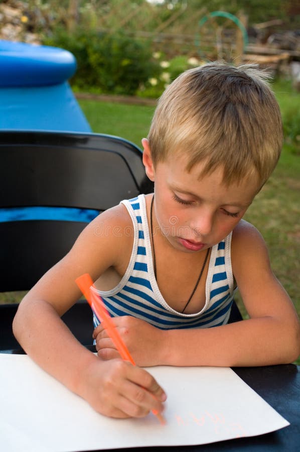 The Little Boy Studies To Write Stock Image - Image of caucasian ...
