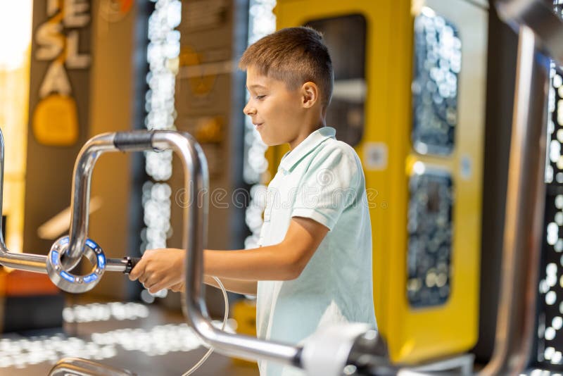 Little Boy Studying Physics and Electricity in Science Museum Stock ...