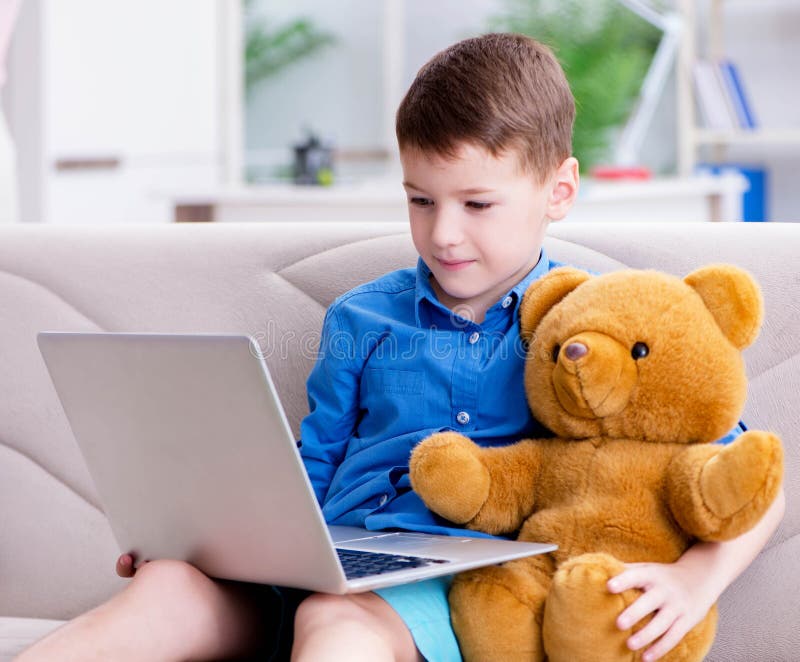 Little Boy Surfing Internet on Laptop Stock Image - Image of laptop ...