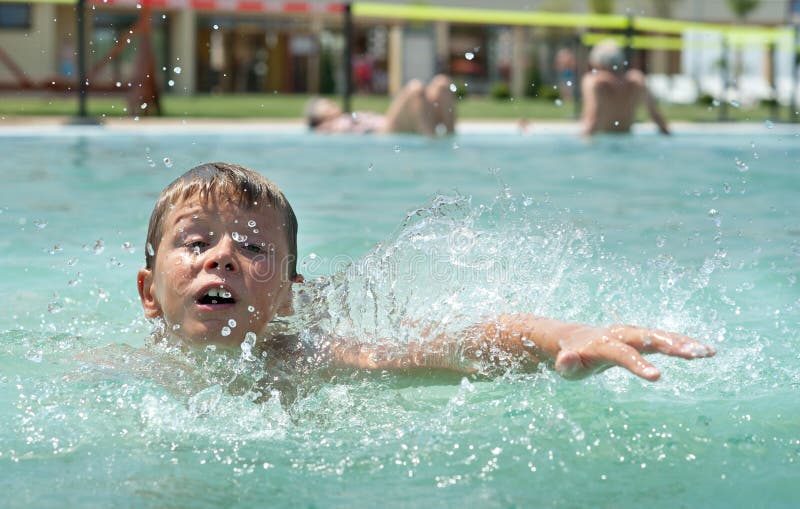 Little boy swimming stock photo. Image of effort, little - 25700810