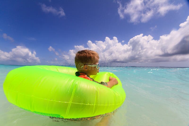 Little Boy Swimming at the Beach Stock Image - Image of summer, smile ...
