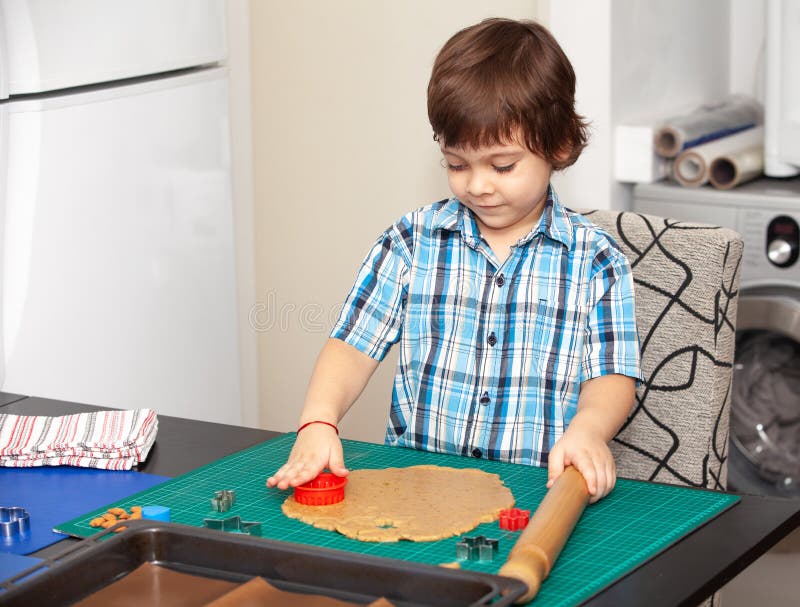 Boy Swinging a Rolling Pin Cookie Dough Stock Image - Image of little ...