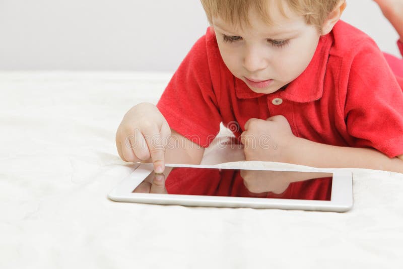 Little boy with tablet stock photo. Image of electronic - 38424460