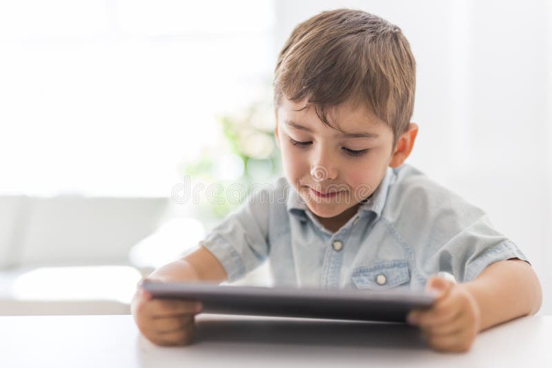 Little Boy with Tablet on the Kitchen Stock Image - Image of person ...